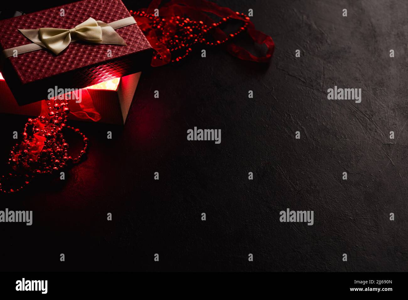 romantic mystery red gift box present dark decor Stock Photo - Alamy