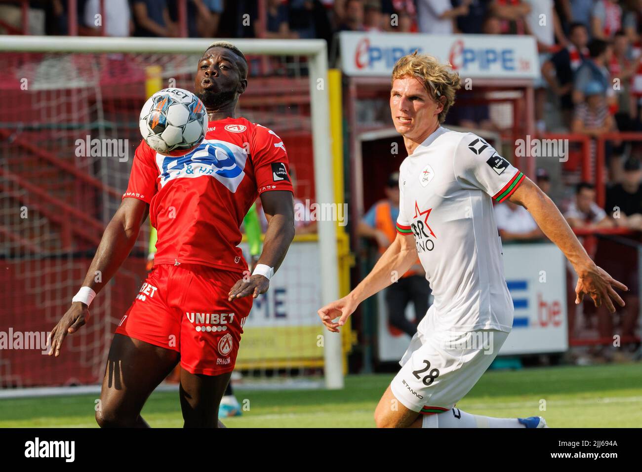 Kortrijk's Pape Habib Gueye and OHL's Ewoud Pletinckx fight for the ball during a soccer match ...