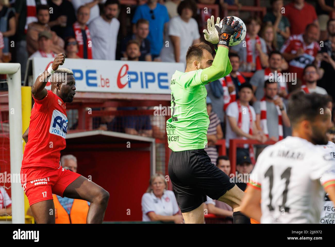 Kortrijk's Pape Habib Gueye and OHL's Valentin Cojocaru fight for the ball during a soccer match ...