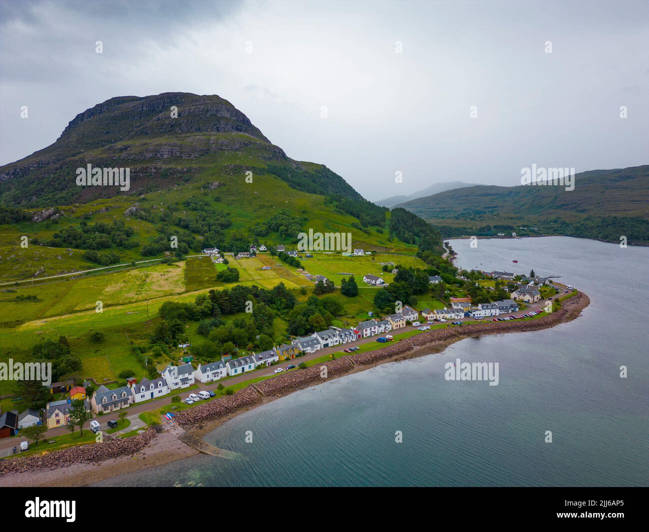 Aerial view of village of Shieldaig on Loch Shieldaig, Ben Shieldaig to ...
