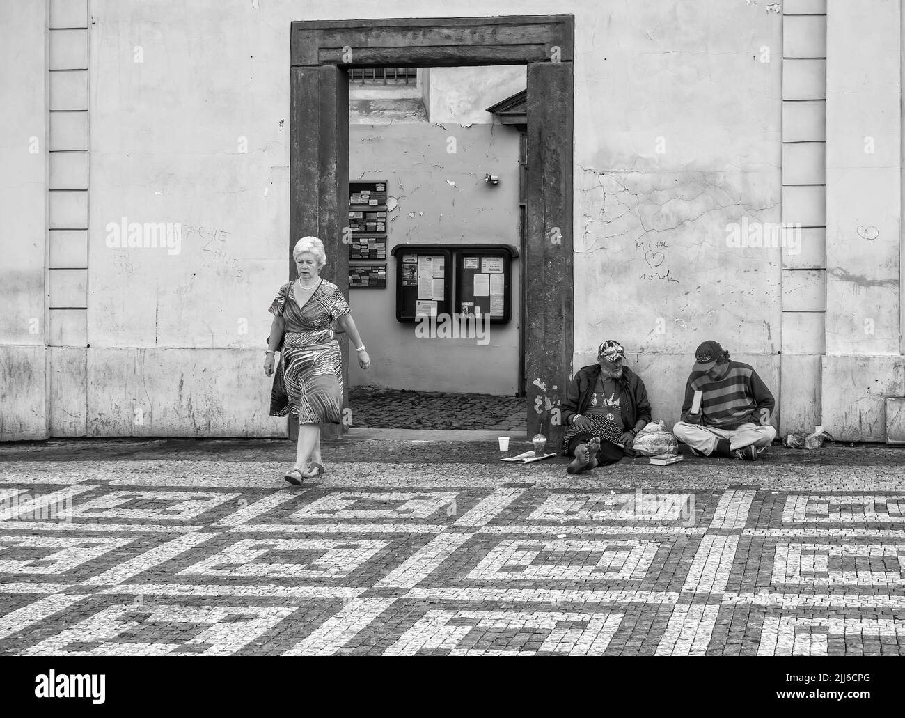 Prague, Czech Republic - June 2022: Two homeless people siting on the ...