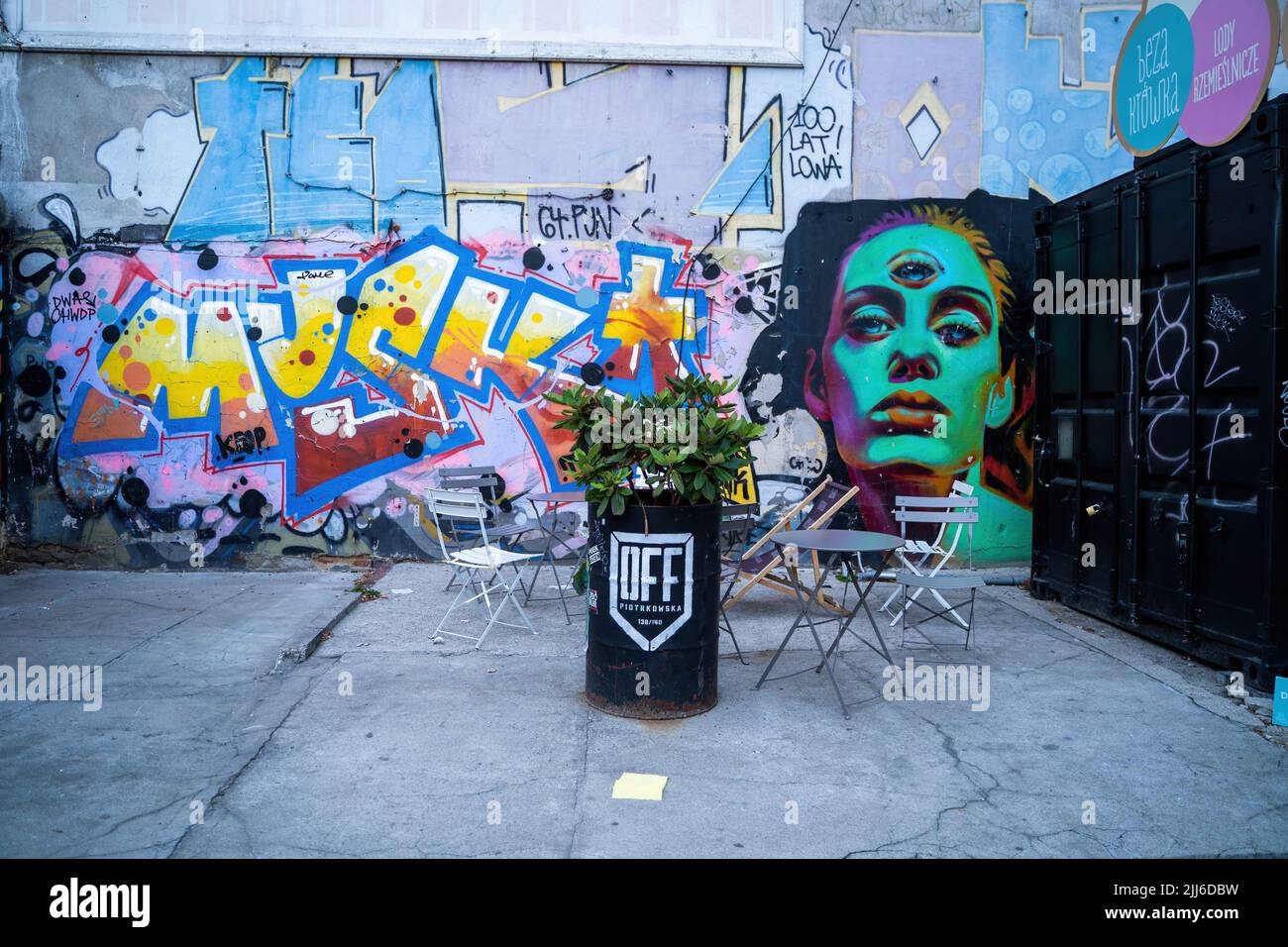Lodz, Poland - July 08, 2022: A colorful street art graffiti next to a ...