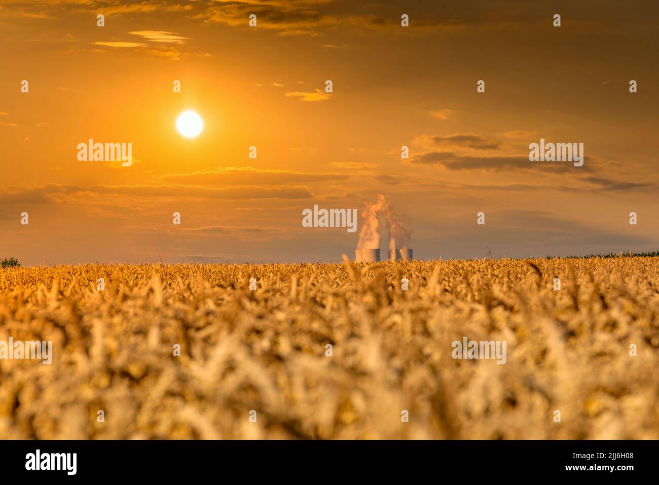 Nuclear power plant Temelin among summer fields on a sunset Stock Photo ...