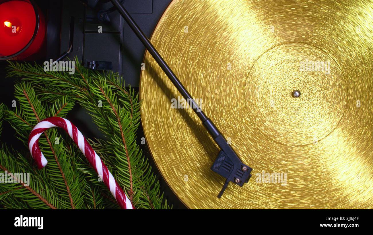 Fortuna gold, movie of retro-styled record player spinning golden vinyl ...