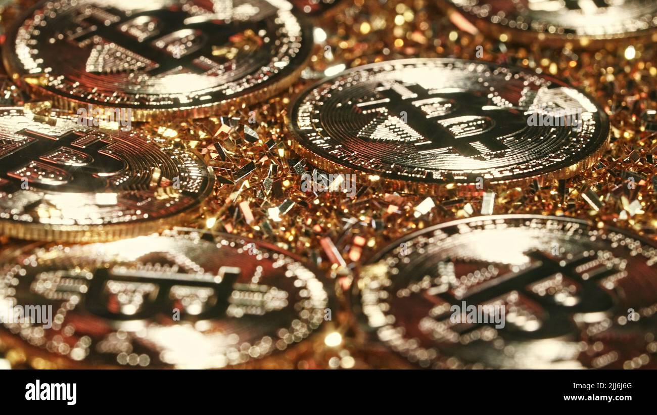 Bitcoin, crypto currency. Golden coins rotating clockwise. Digital ...