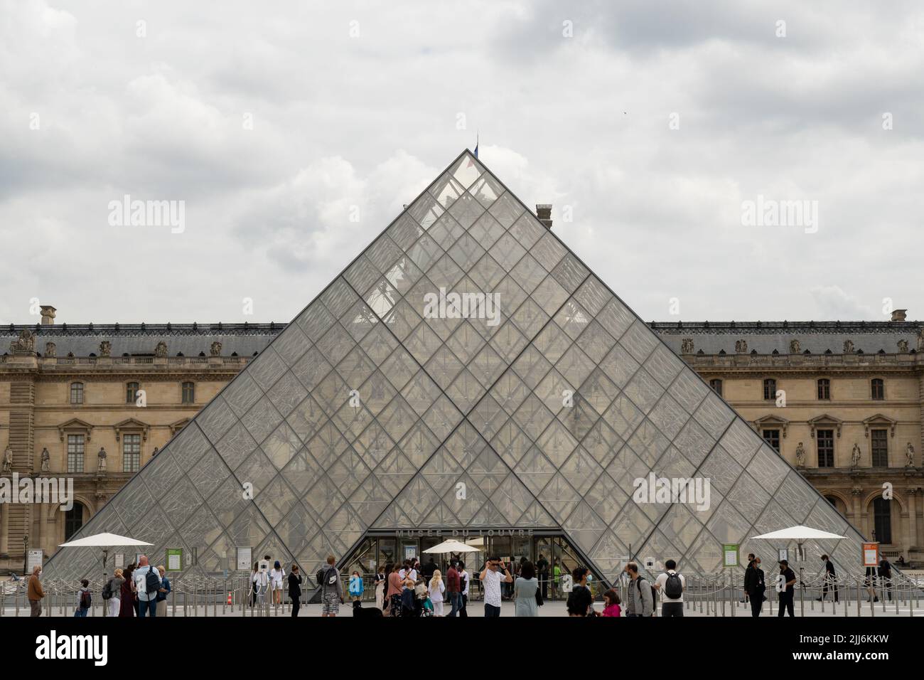 A beautiful shot of the Glass Pyramid of the Louvre Museum in Paris ...