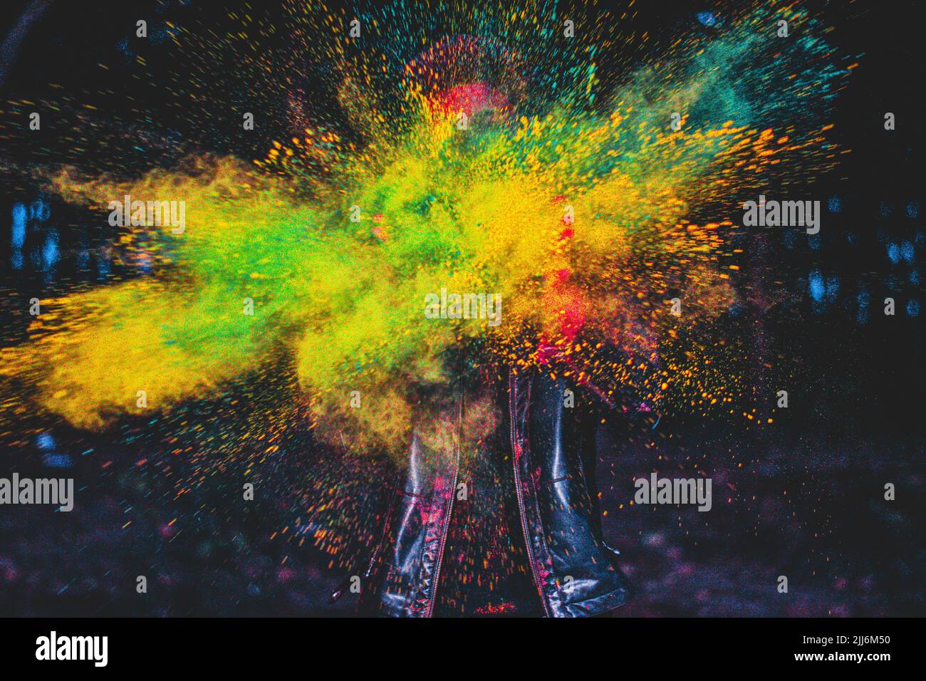 An abstract colorful powder explosion background Stock Photo - Alamy
