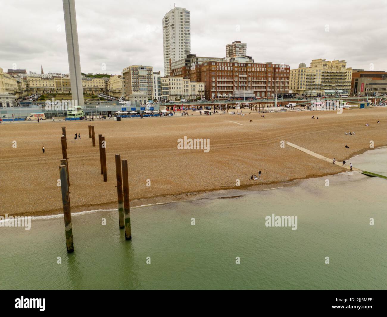 Summer scene on Brighton Beach UK Stock Photo - Alamy