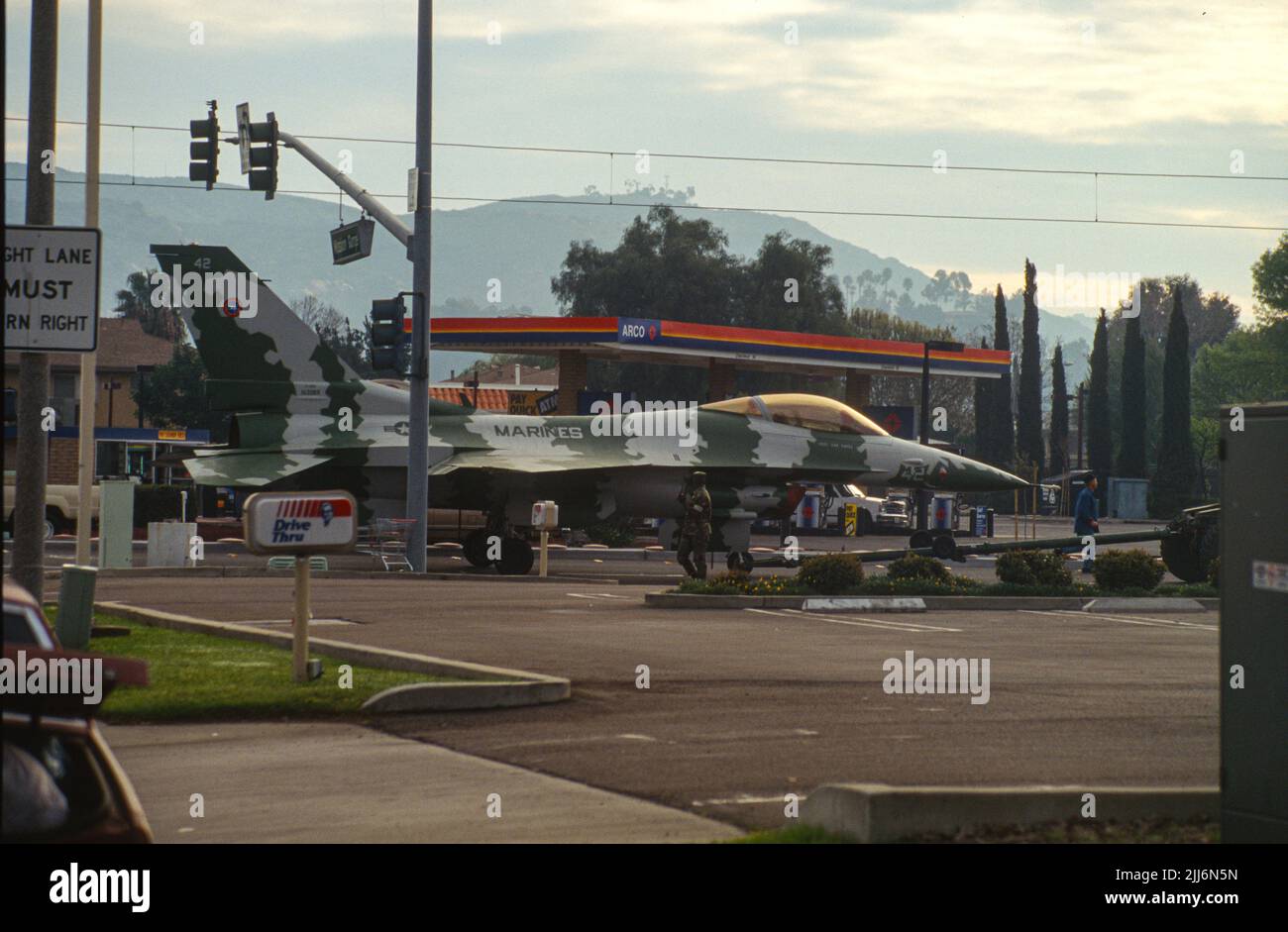 Top Gun F-16 Fighting Falcon on the streets of San Diego being towed to ...