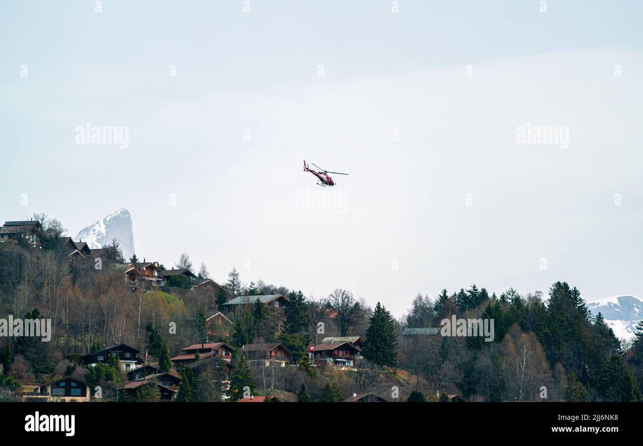 Helicopter over houses hi-res stock photography and images - Alamy