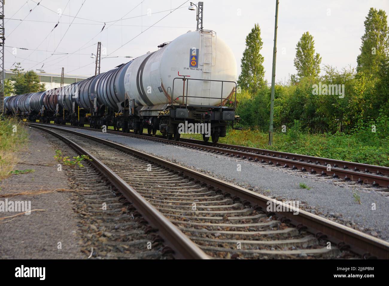 The view of the cargo train with oil tanker cars on the railways Stock ...