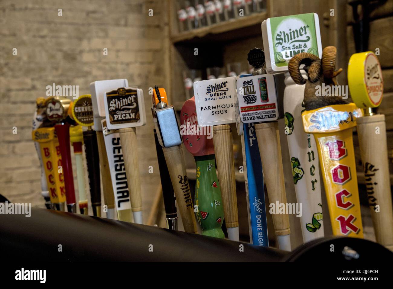 A closeup shot of Shiner beer tap handles at Shiner brewery in Texas ...