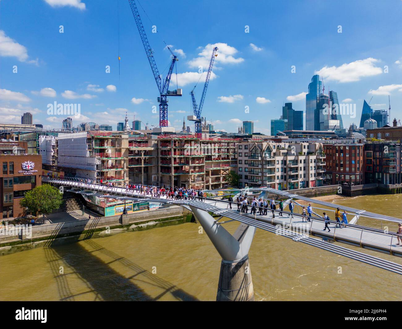 People walking on the Millennium Bridge London UK Stock Photo - Alamy