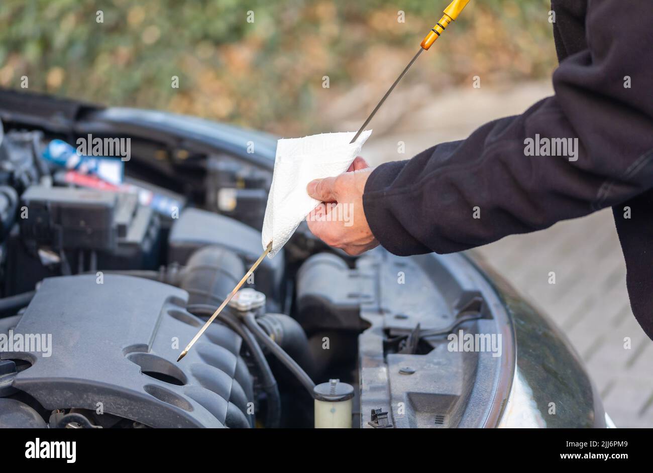 Checking the oil level in a car hi-res stock photography and images - Alamy