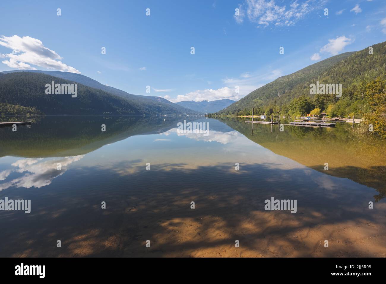 Mountain summer landscape of a beautiful calm idyllic reflection on ...