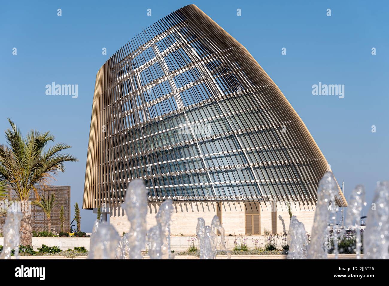 Curved abstract architectural building in Ayia Napa marina. Famagusta ...