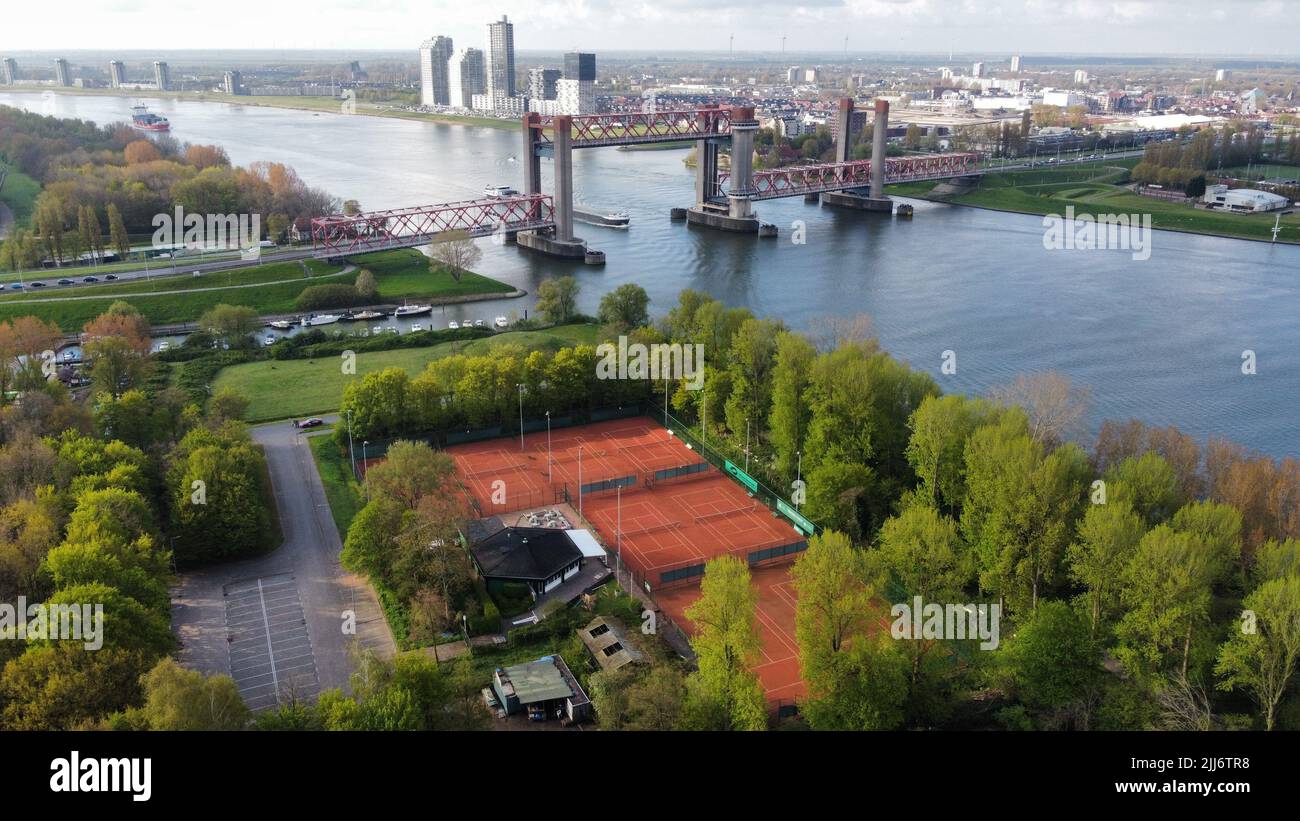 An aerial distant view of the Spijkenisserbrug Bridge in Hoogvliet ...