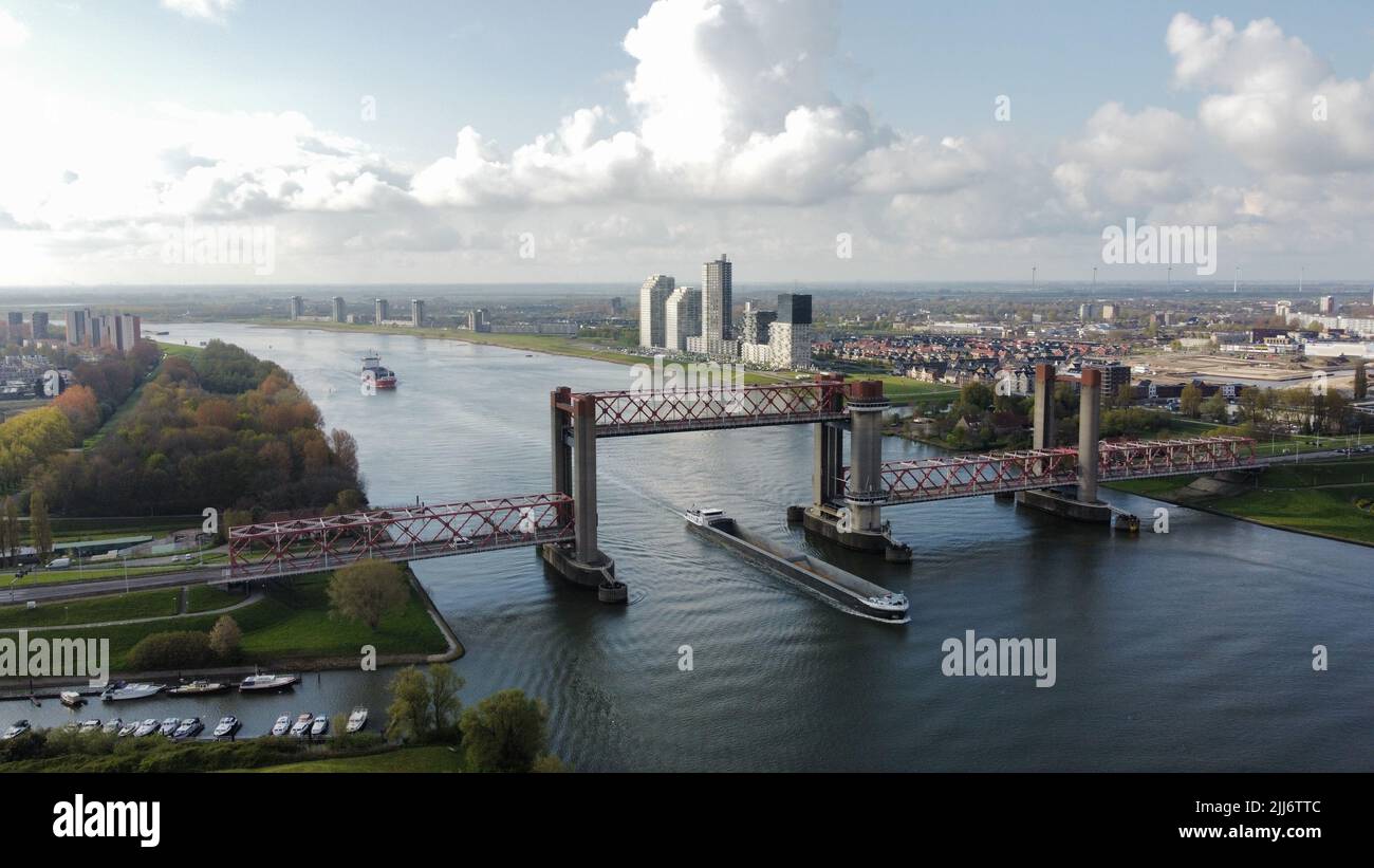 An aerial distant view of the Spijkenisserbrug Bridge in Hoogvliet ...