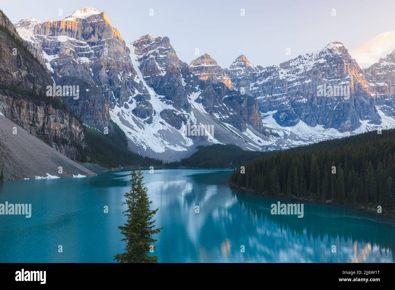 Scenic sunset or sunrise view of glacial Moraine Lake landscape, a ...