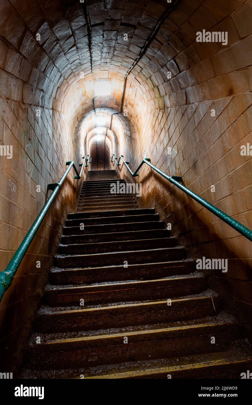 A vertical low angle shot of steps going up the smugglers tunnel ...