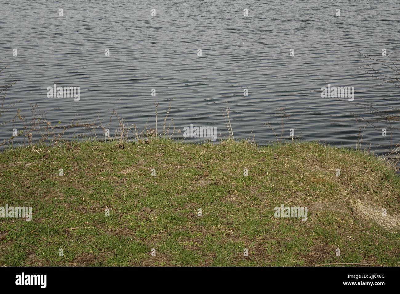 Green grass shore and wave water at Sauer Delta national natural ...
