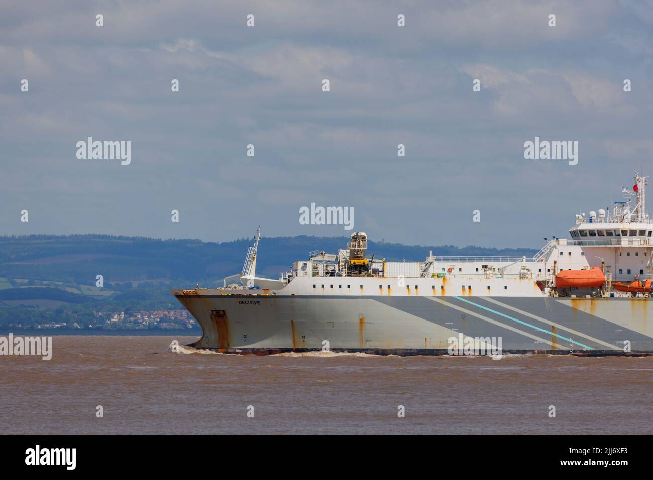 Cable layer Decisive heading out to sea Stock Photo - Alamy