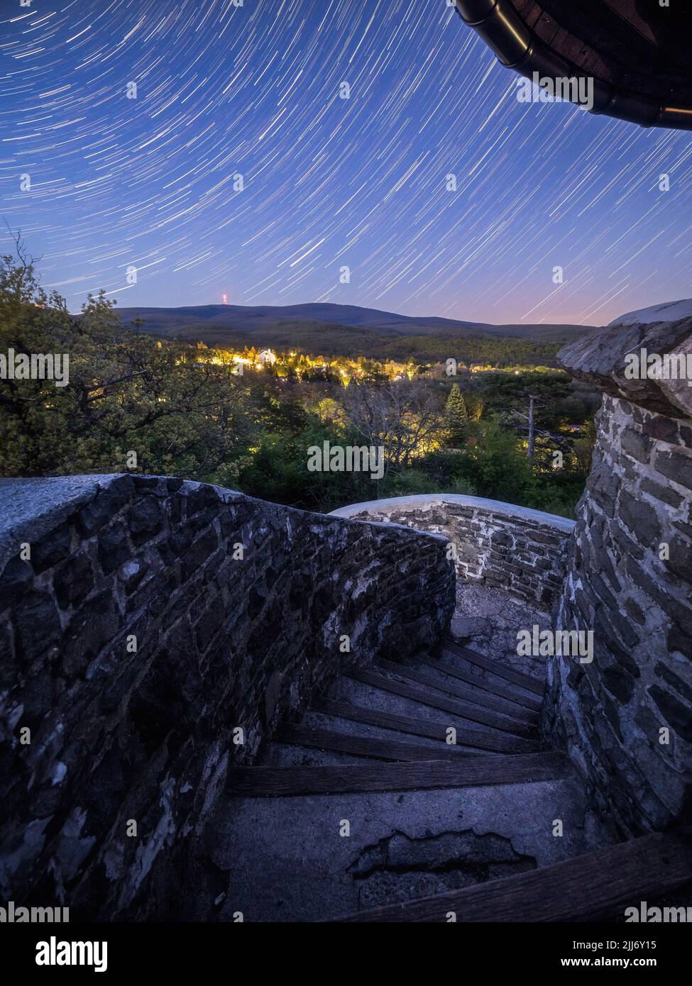 A vertical shot from the Kozmary lookout tower of a meteor shower in ...