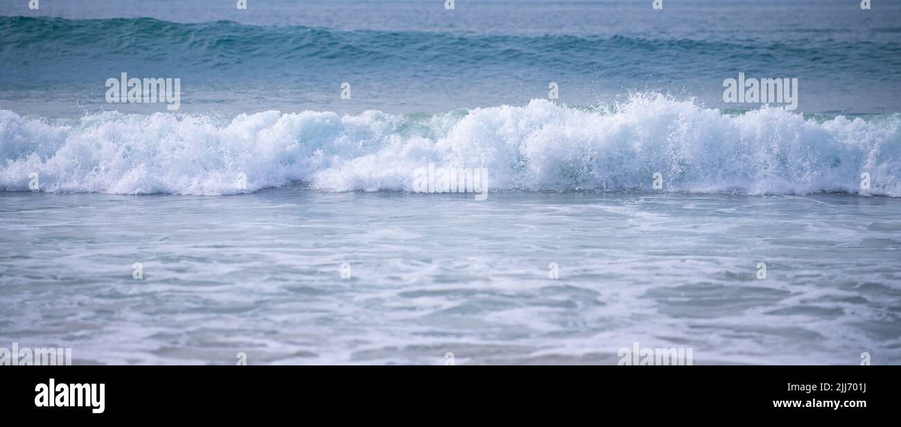Waves in the ocean. Turquoise sea waves. Beautiful sea waves with foam ...