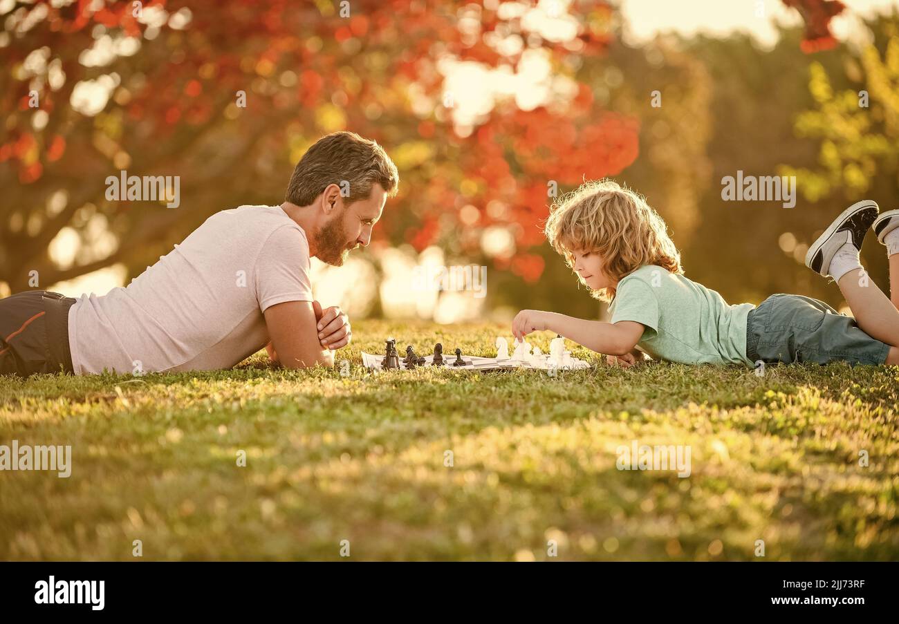 spending time together. strategic and tactic. tutorship. dad and kid ...