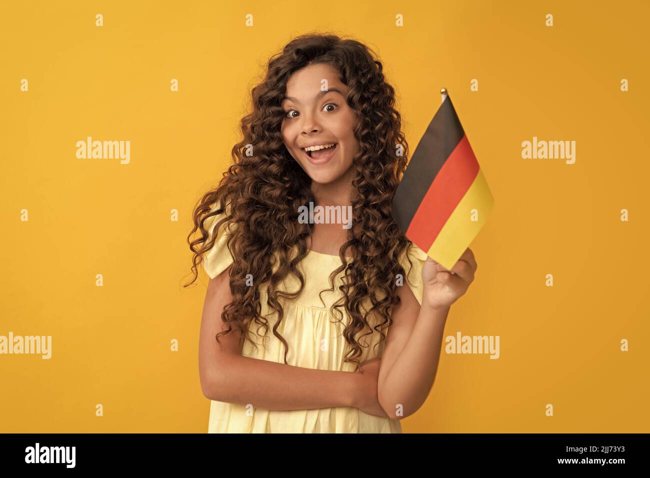 travel to germany. amazed teen girl hold german flag. schengen ...