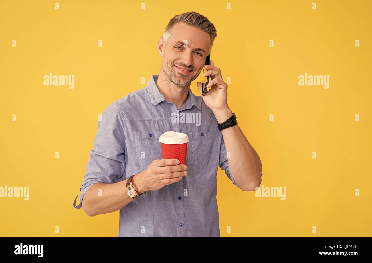 smiling guy drink takeaway tea. good morning. communication Stock Photo ...