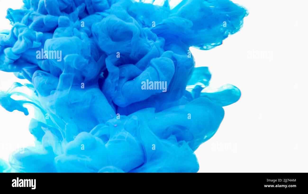 an Ink drop in water isolated on white background Stock Photo - Alamy