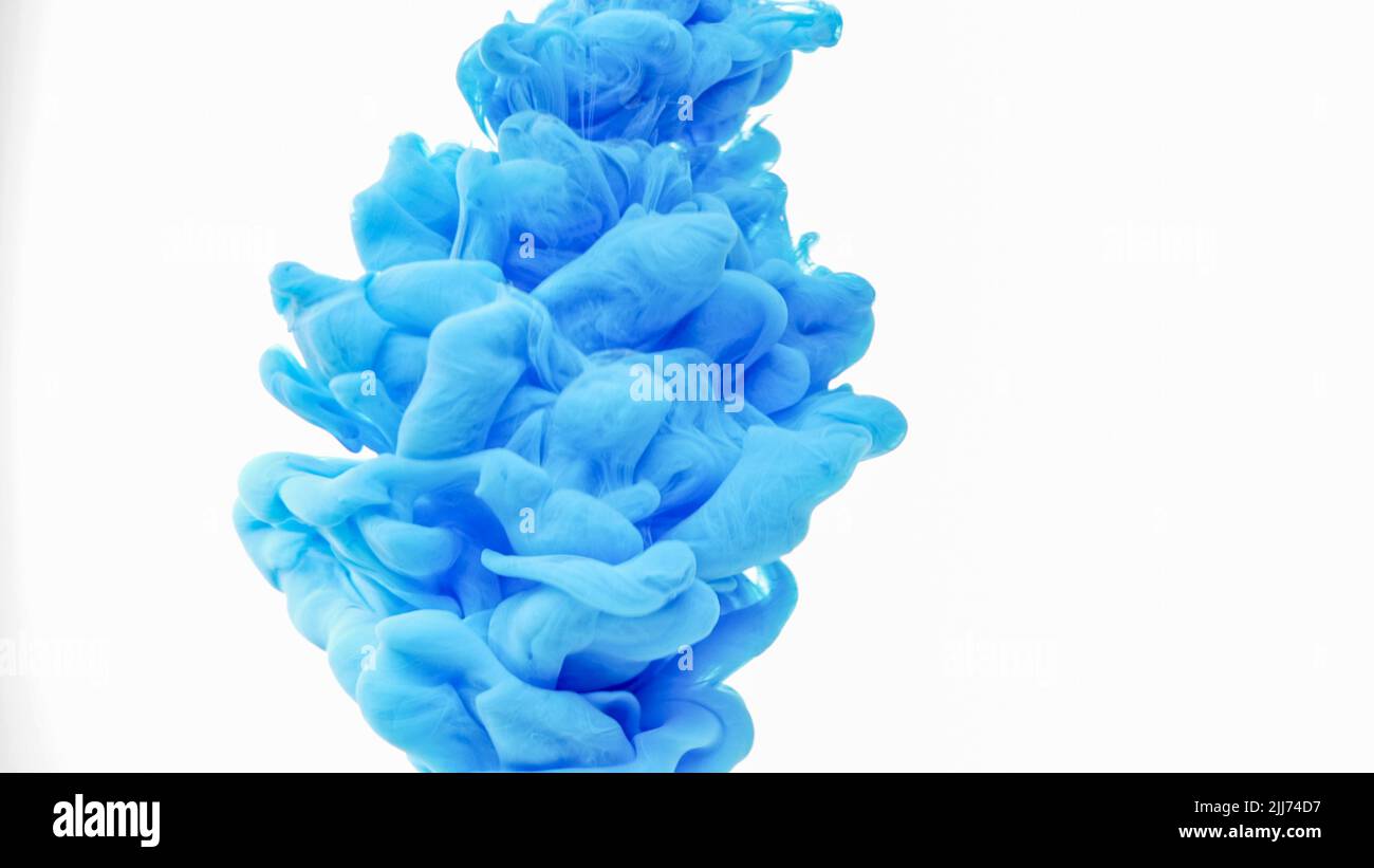 an Ink drop in water isolated on white background Stock Photo - Alamy