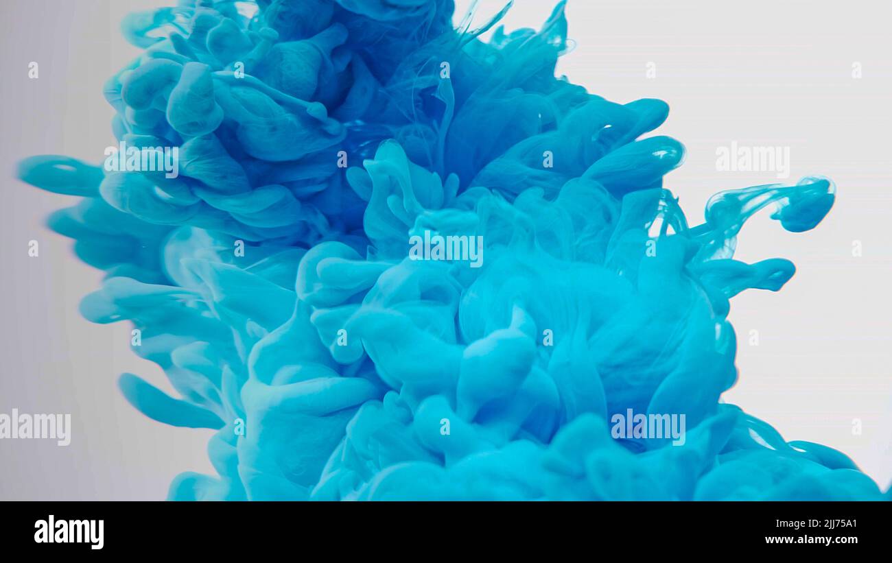 an Ink drop in water isolated on white background Stock Photo - Alamy