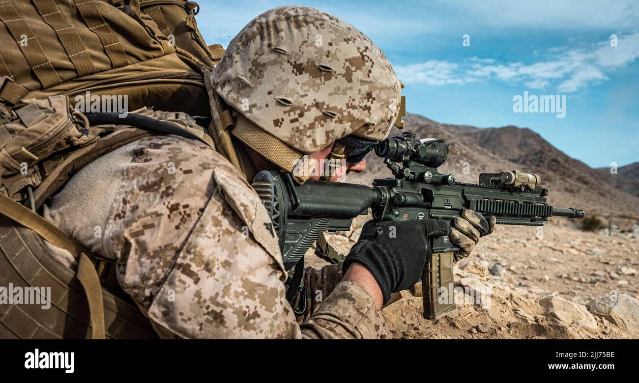 A U.S. Marine with India Company, 3rd Battalion, 23rd Marine Regiment ...
