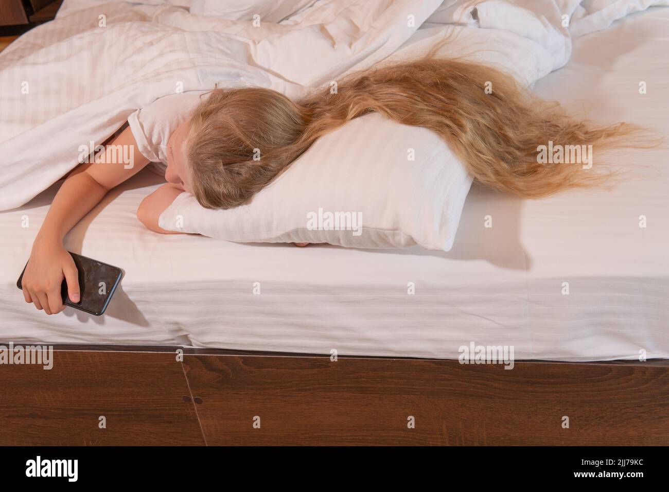 Sleep beautiful young mobile phone girl bed blanket eyes lying, for ...