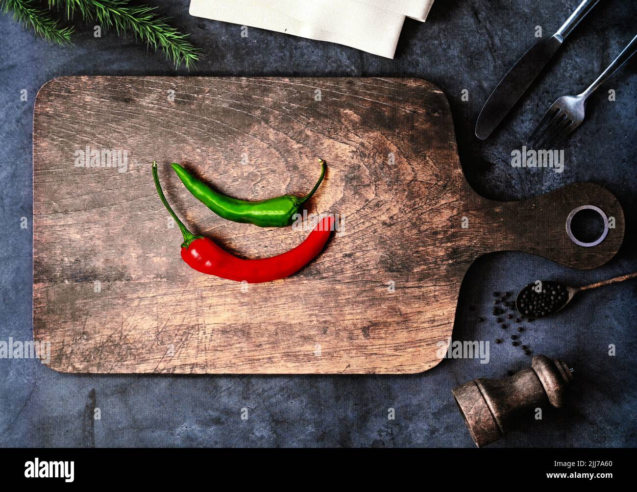 Red Chili pepper with wood and styling Stock Photo - Alamy