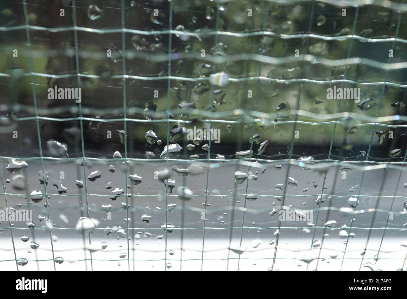 Water droplets on the window of an apartment after the rain Stock Photo ...