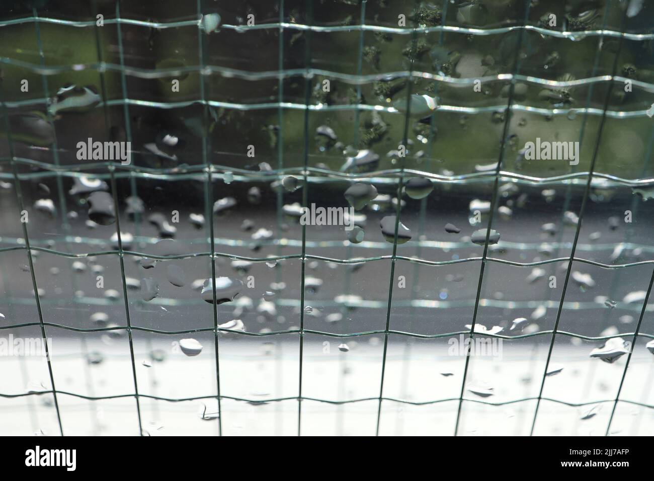 Water droplets on the window of an apartment after the rain Stock Photo ...