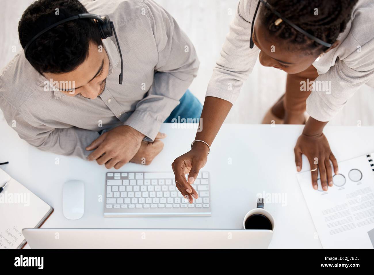 Two african business colleagues stand hi-res stock photography and ...