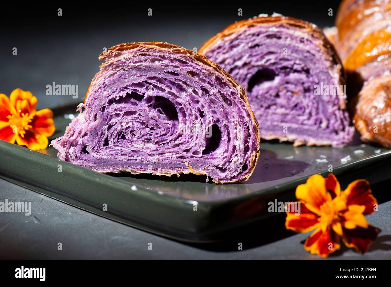 Fresh baked home made Ube Croissants using flavouring and purple yam ...