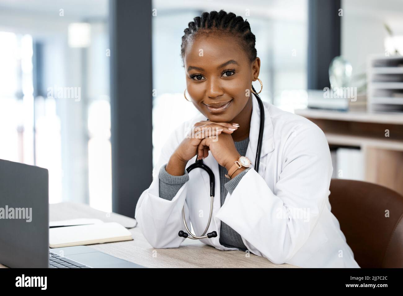 Beautiful young african female doctor hi-res stock photography and ...