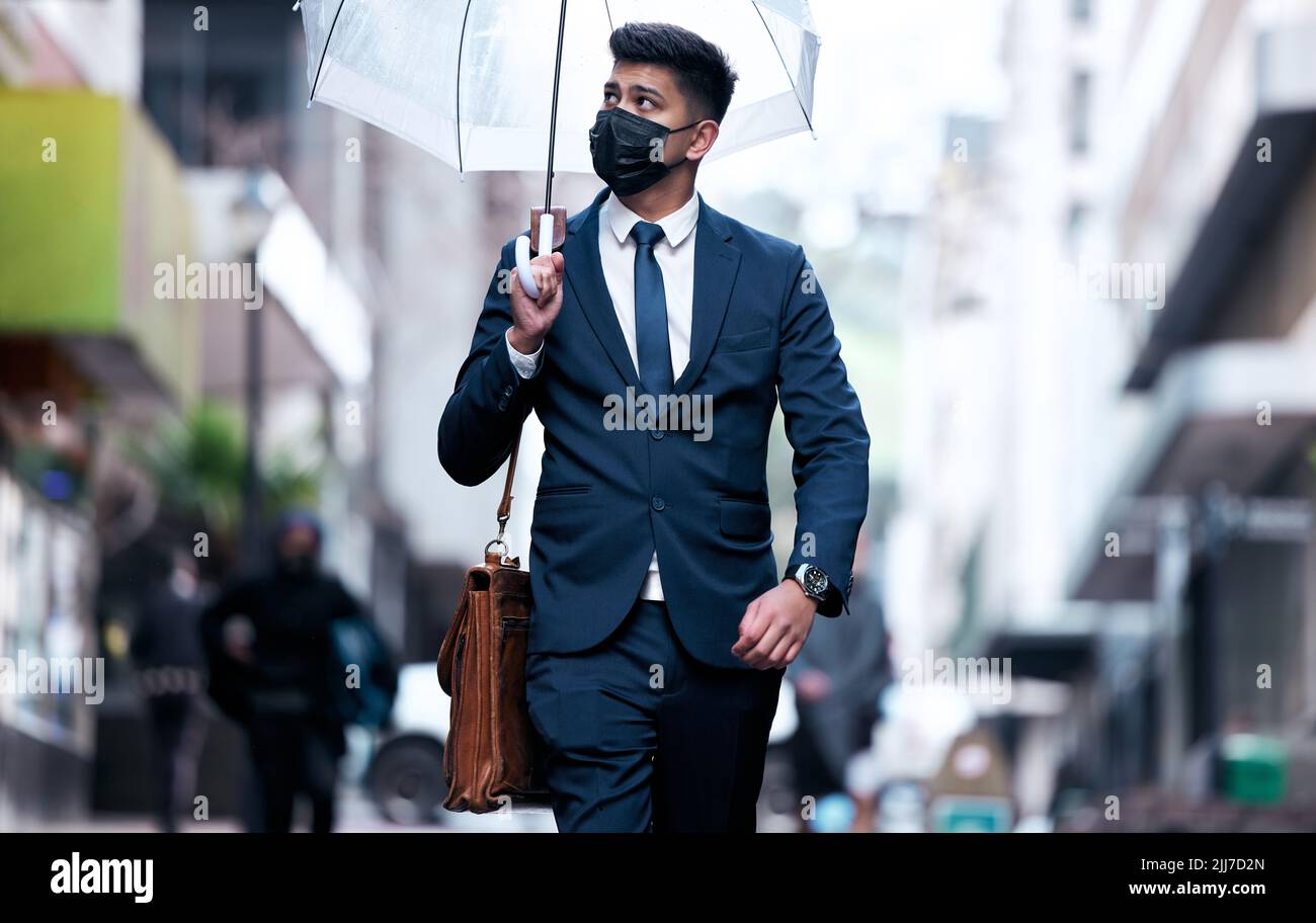 Paving his path in the new world. Portrait of a young businessman ...