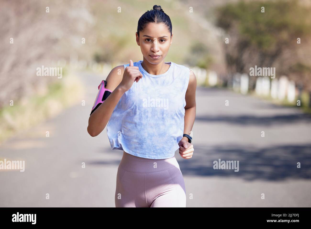 Each stride has purpose. Cropped portrait of an attractive young female ...