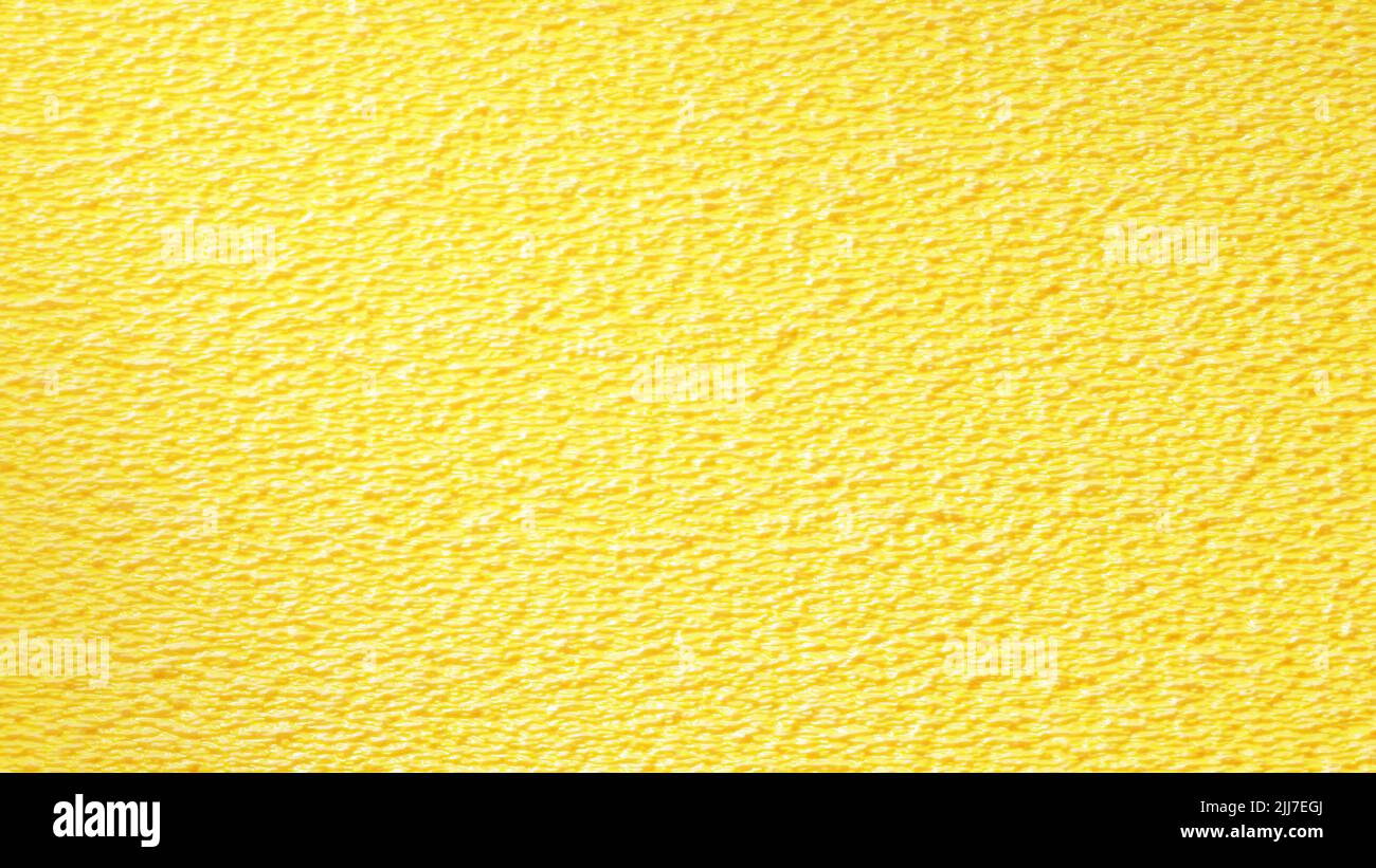 Yellow texture with pores and an uneven surface. Blurred background ...