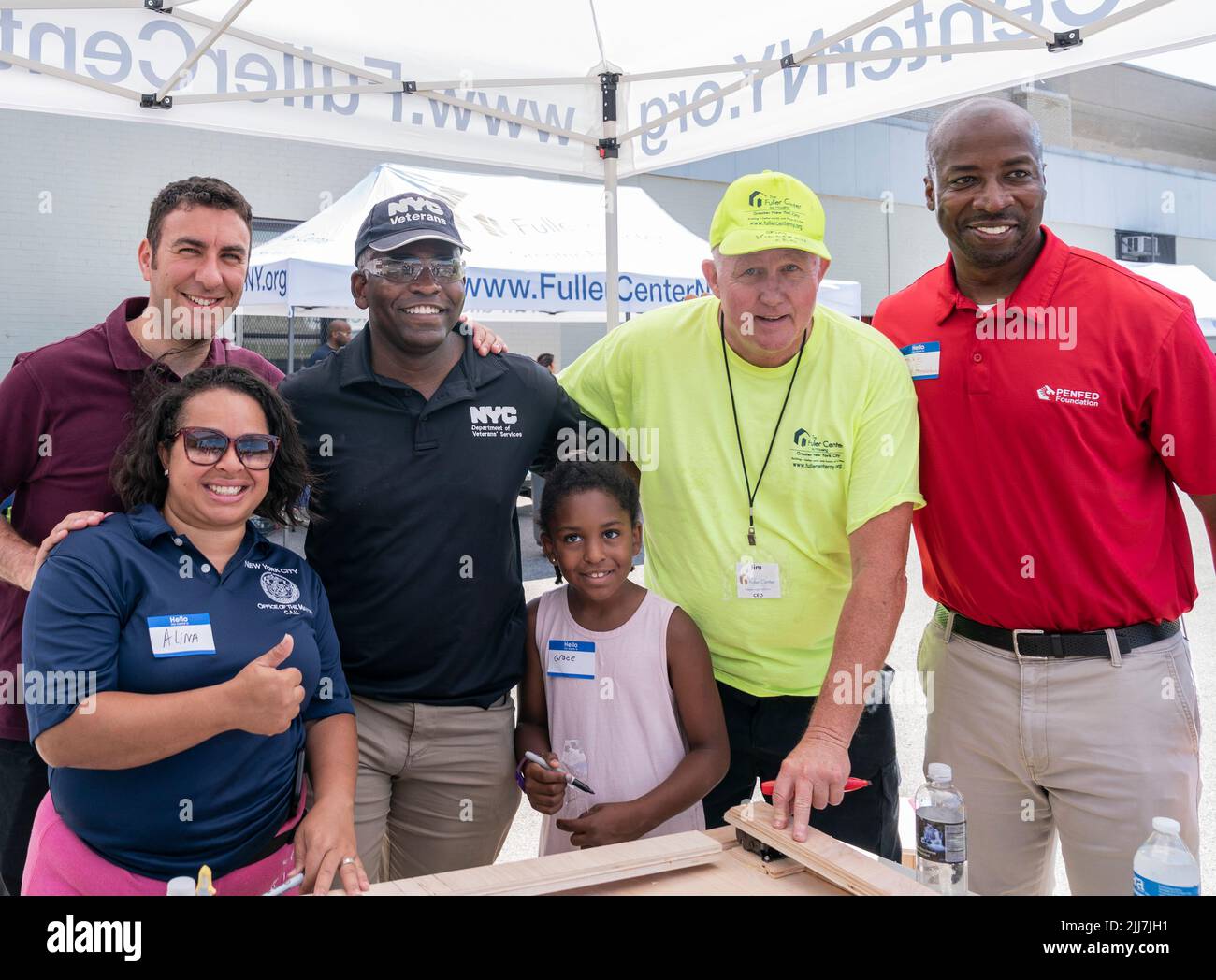 New York, NY - July 23, 2022: Volunteer Alina, Eric Donowitz, James ...