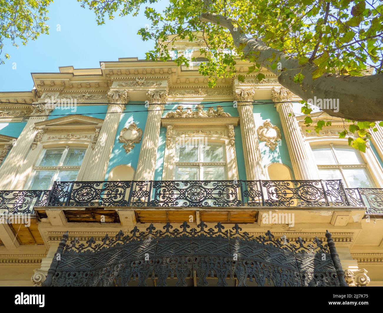 Decorative balcony of old building Stock Photo - Alamy
