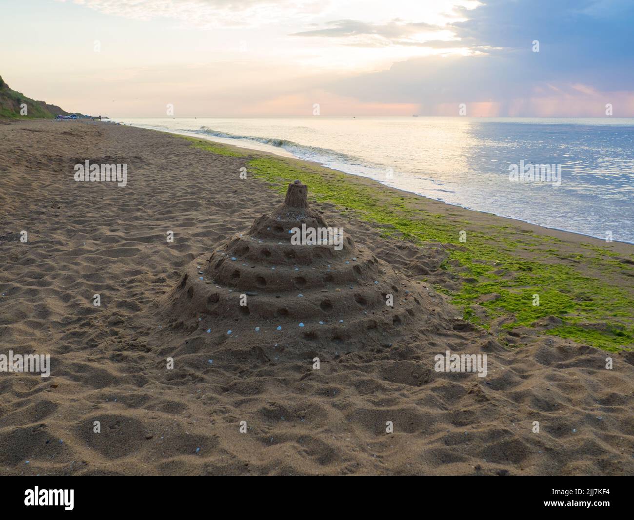 Built House sand castle with tower on the shore of the beach Stock ...