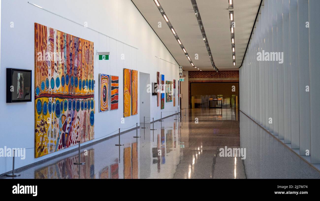 Indigenous artwork hanging on wall of long corridor in Boola Bardip WA ...