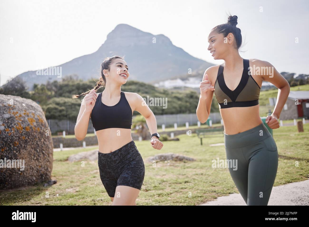 Friends forever in life and fitness. two fit young women going for a ...